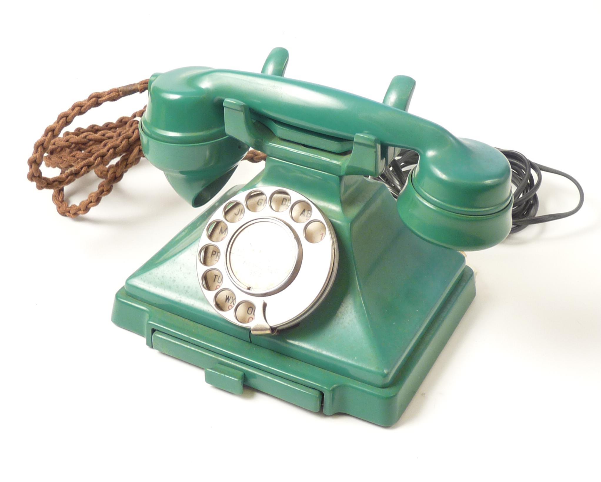 A vintage green bakelite telephone