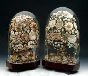 TWO EARLY VICTORIAN SHELLWORK ORNAMENTS each in the form of a flowering ...