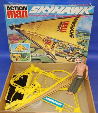 Boxed Action Man Skyhawk and one flock-haired Action Man figure.